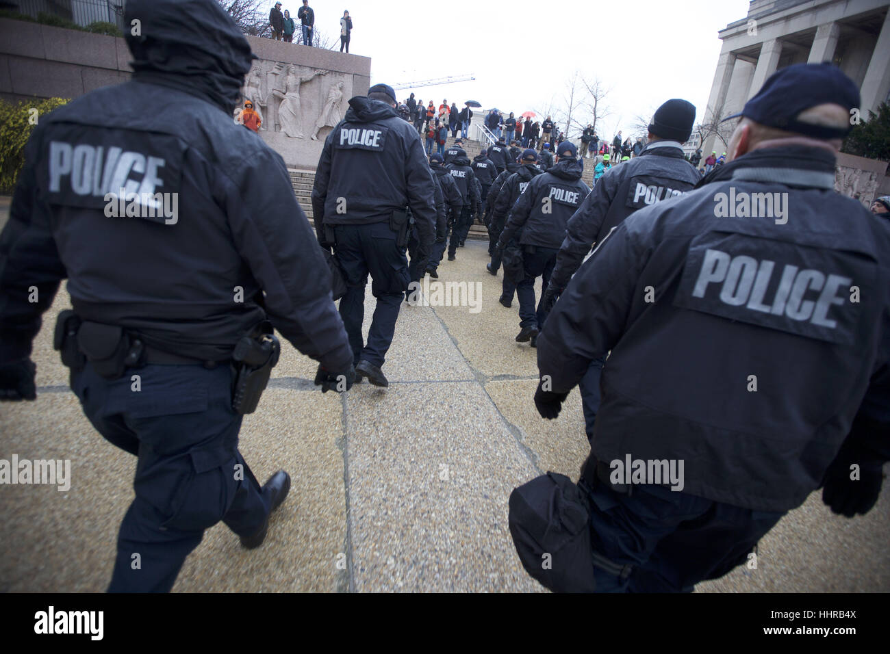 Washington, USA. 20th Jan, 2017. Police patrol the grounds outside of ...