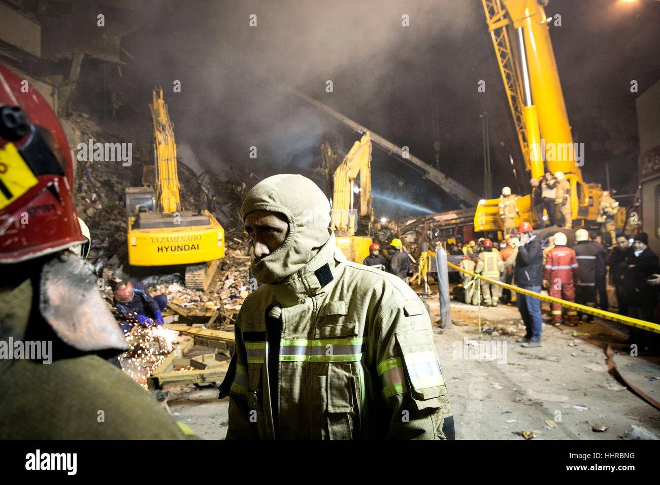 Tehran, Iran. 20th Jan, 2017. Rescuers work after the collapse of a ...
