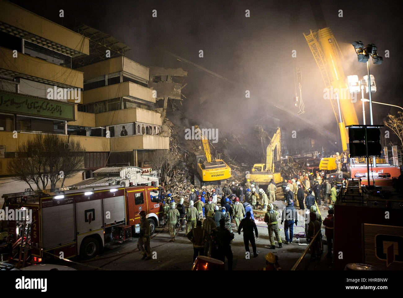 Tehran, Iran. 20th Jan, 2017. Rescuers work after the collapse of a ...
