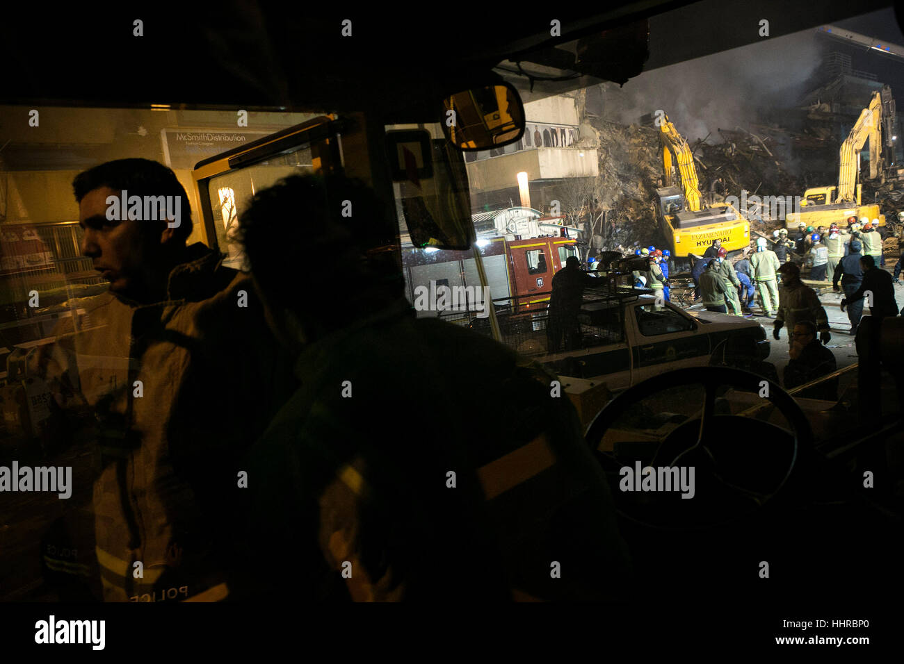 Tehran, Iran. 20th Jan, 2017. Rescuers work after the collapse of a ...