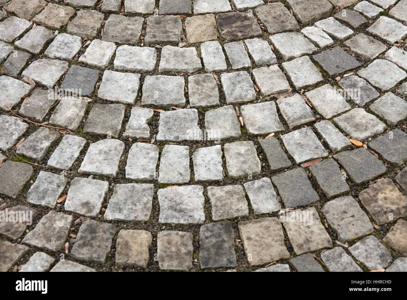 Old pavement made of small stones Stock Photo - Alamy