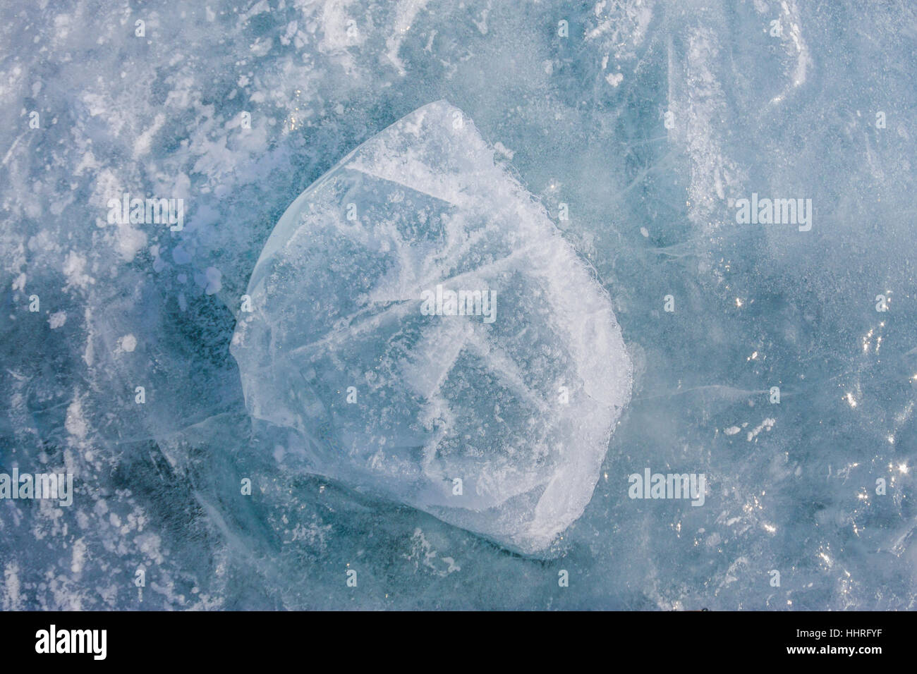 Ice Block covered with cracks texture on the lake Stock Photo - Alamy