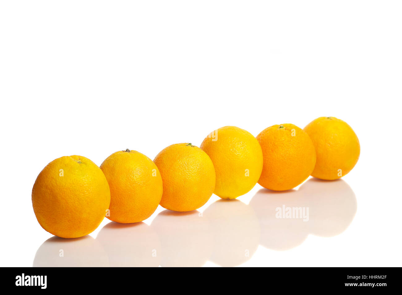 oranges in a line Stock Photo - Alamy