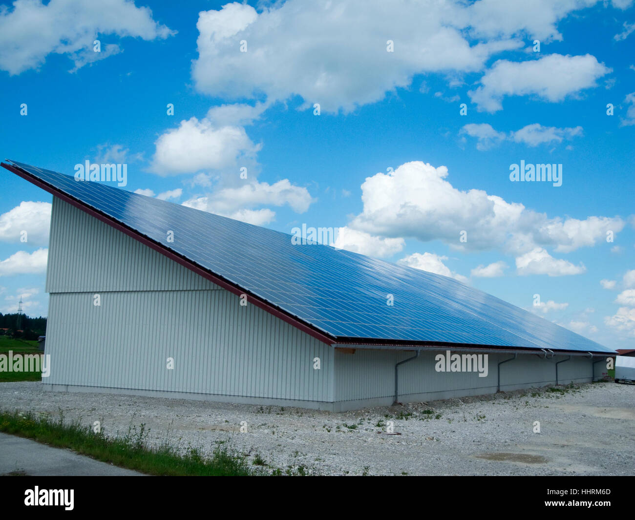 Oblique and lateral view of a modern agricultural building with ...
