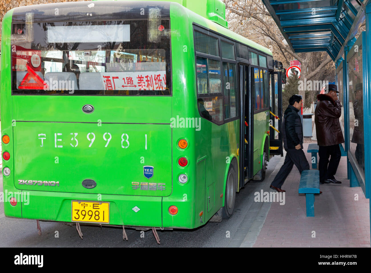 Bus stop and passengers, Zhongwei, Ningxia province, China Stock Photo ...
