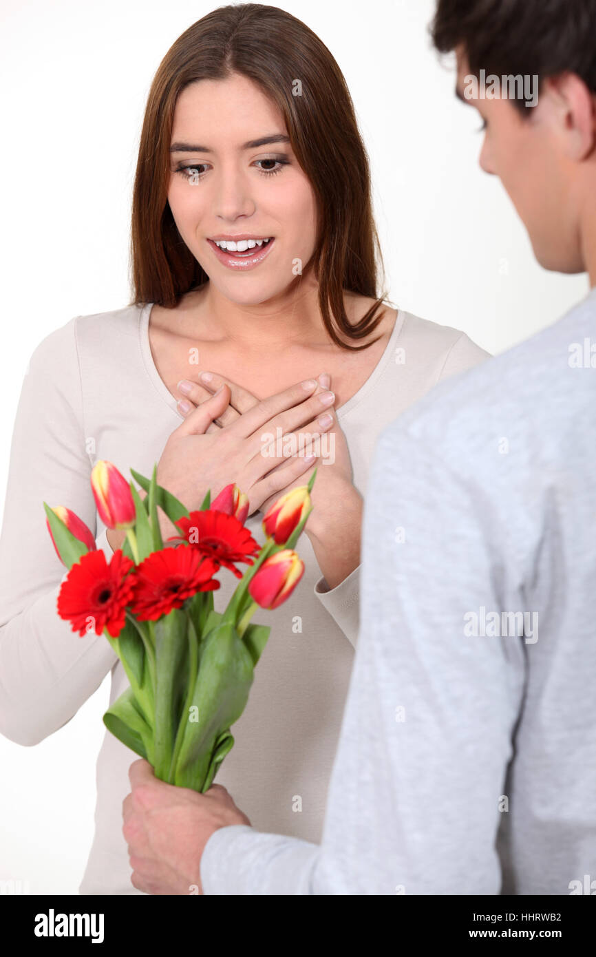 Man giving bouquet girl valentines hi-res stock photography and images - Alamy