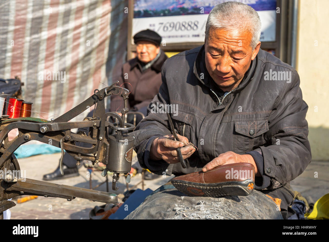 Street cobbler hi-res stock photography and images - Alamy