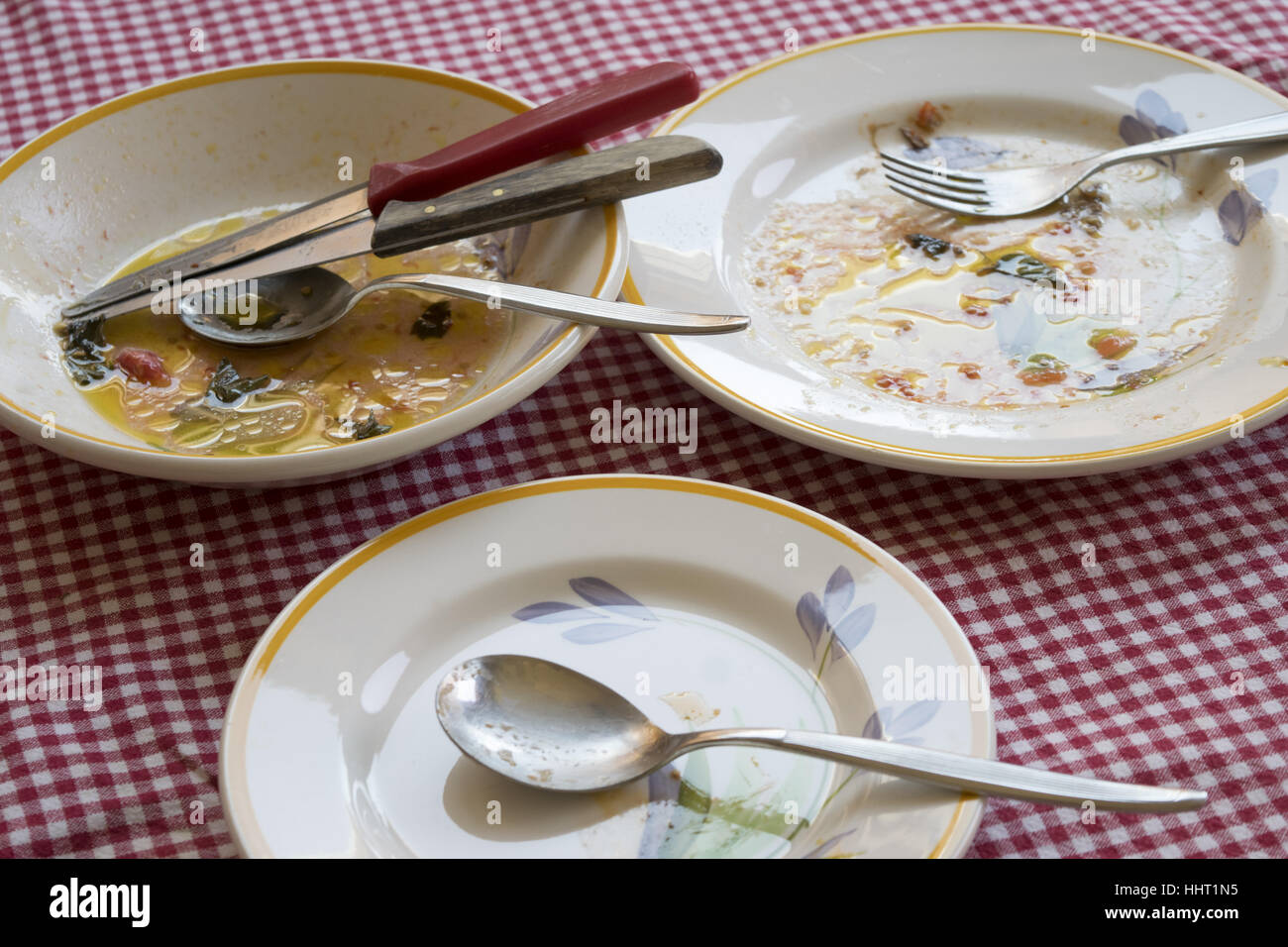 scraps left over and dirty dishes after dinner Stock Photo - Alamy