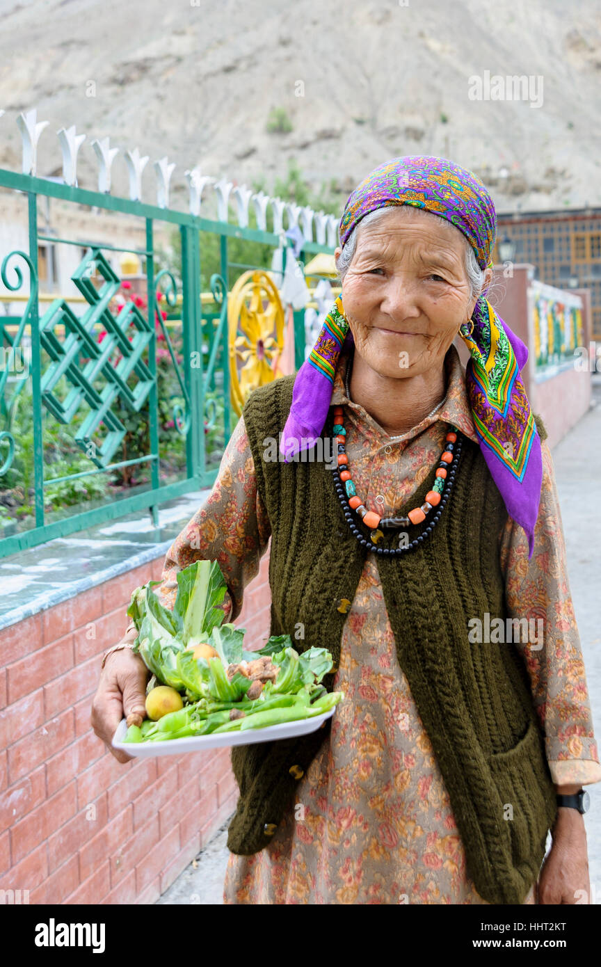 Old lady carrying food in hi-res stock photography and images - Alamy