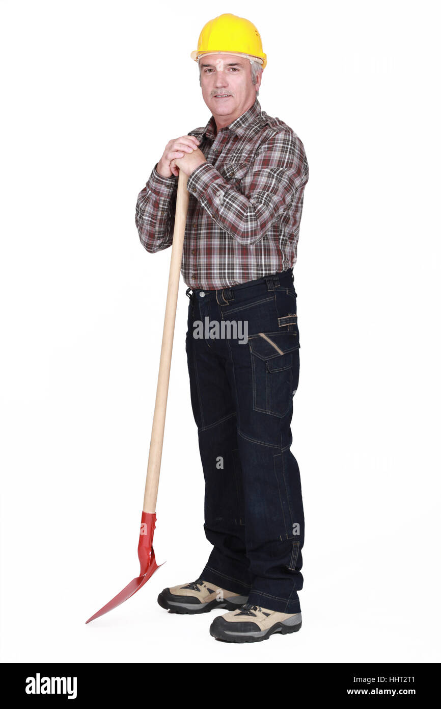 Construction workers digging hole Cut Out Stock Images & Pictures - Alamy Construction workers digging hole Cut Out Stock Images & Pictures - Alamy