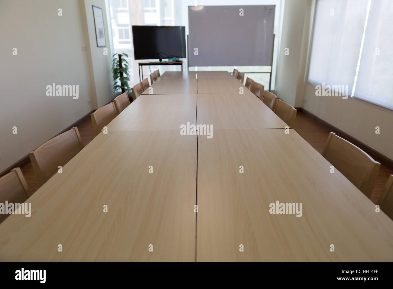 wood table and chair in meeting conference room in office workpace ...
