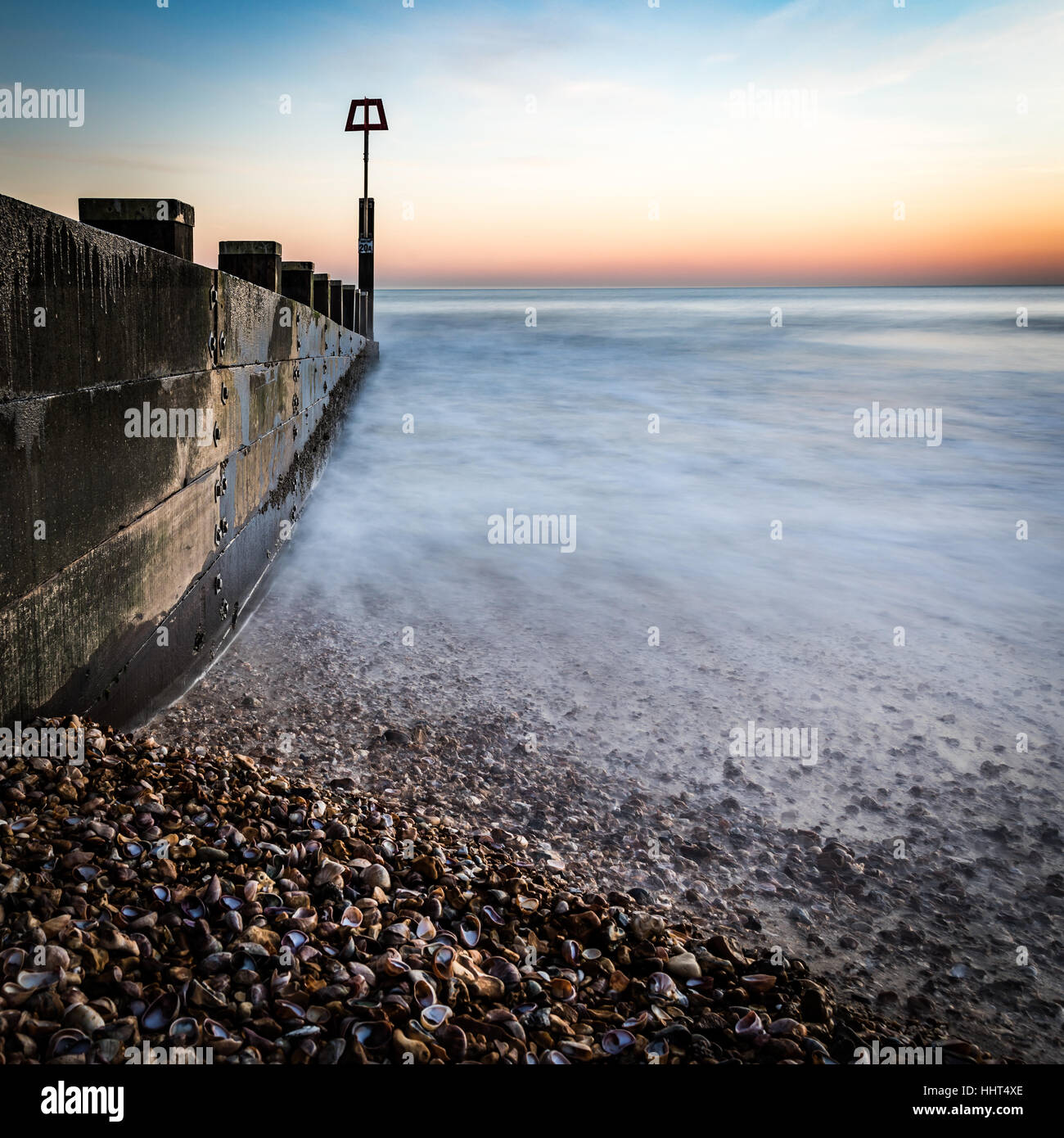 Long exposure of Bournemouth Beach Groyne at sunset Stock Photo - Alamy