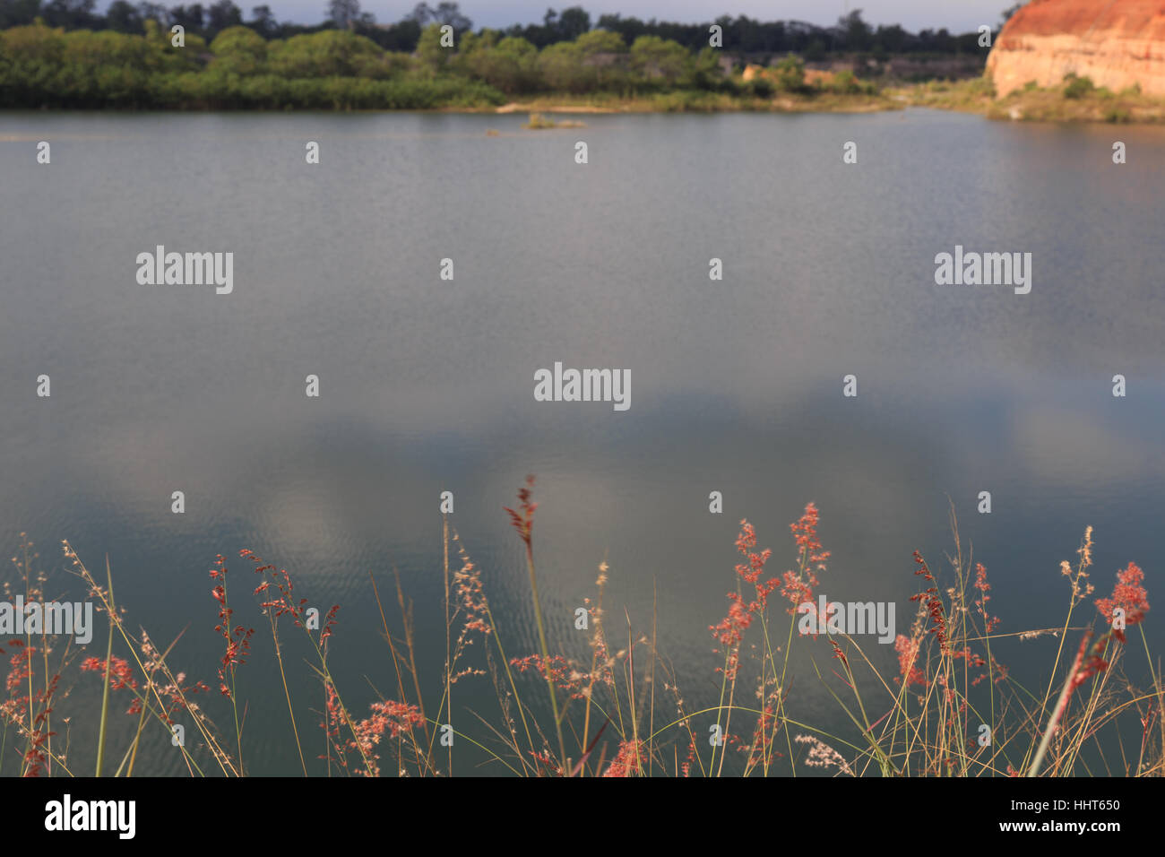 landscape view of orange valley hill and water pond lake Stock Photo ...