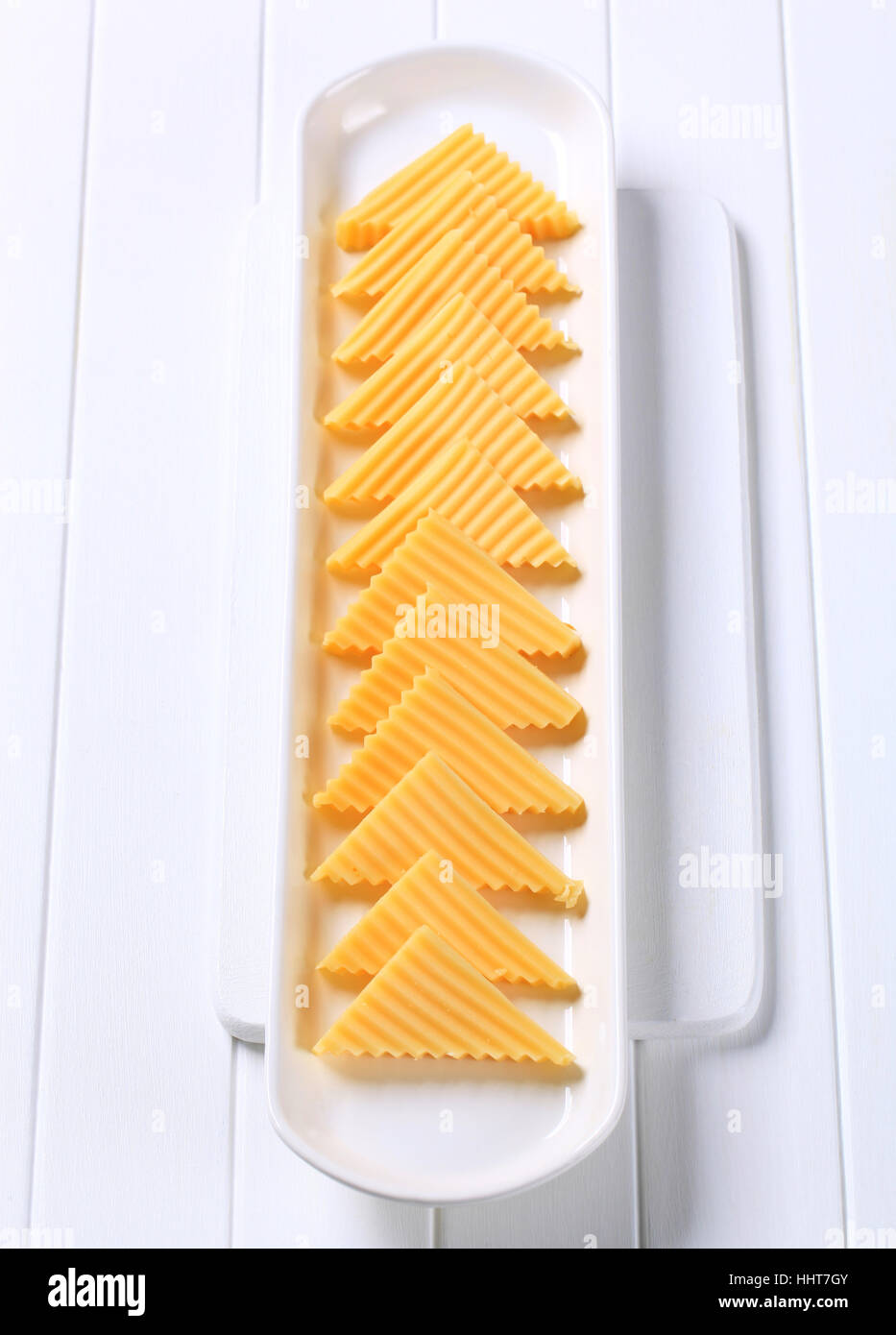 food, aliment, closeup, long, cheese, triangles, oval, dairy, porcelain ...