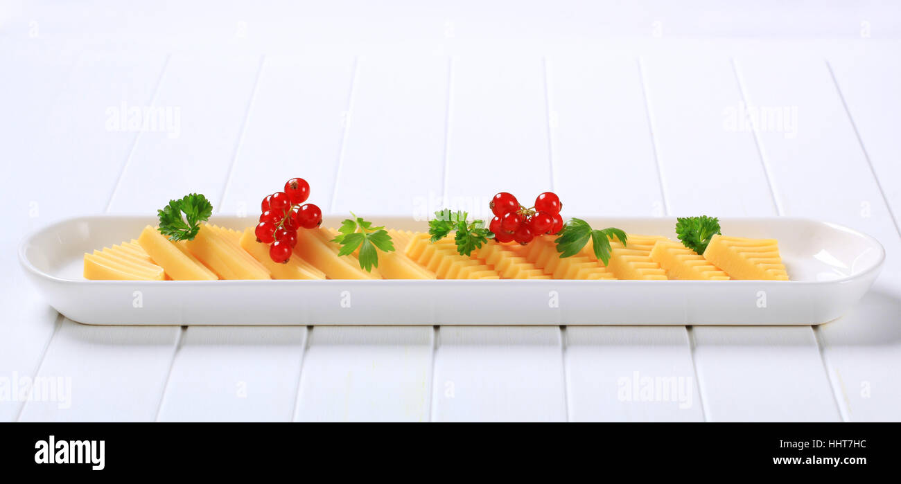 Hard Cheese Cut Into Triangles Stock Photo Alamy