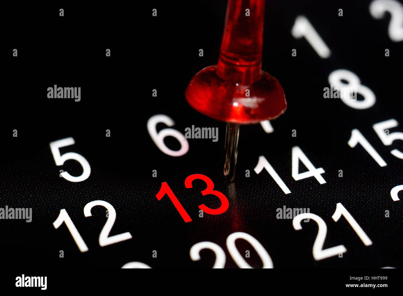 Pin on the date number 13 on calendar Stock Photo - Alamy