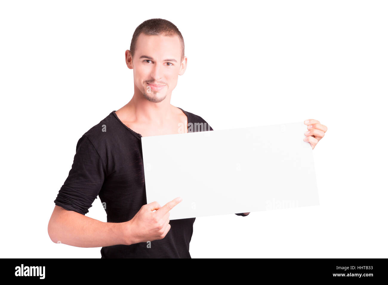 young man pointing at light gray panel Stock Photo - Alamy
