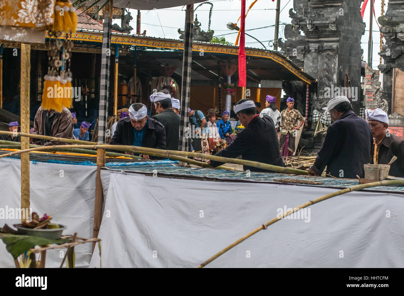 People working, preparing things for the ceremony, pura tuluk biyu ...