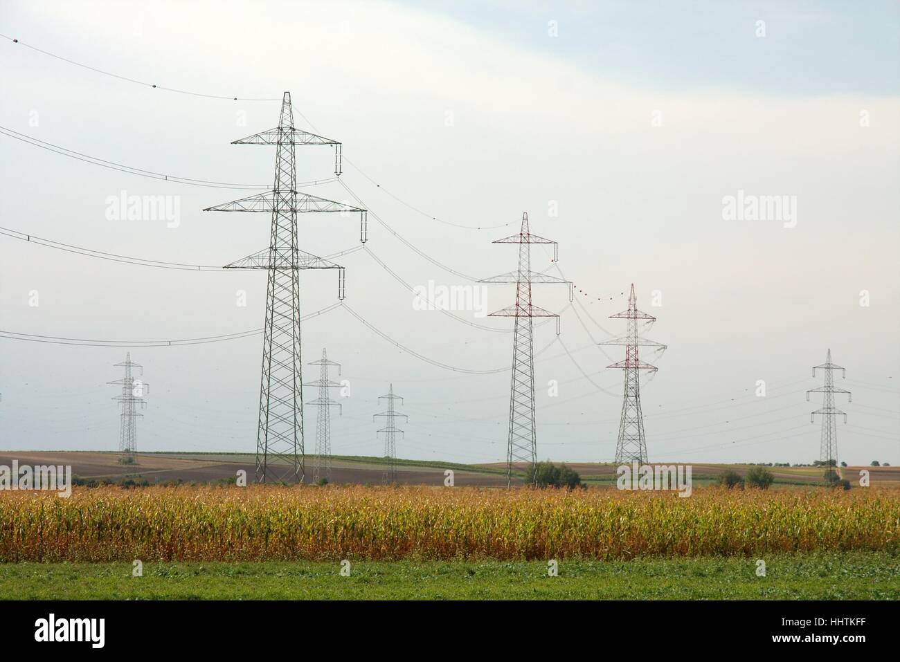 High voltage electric main lines going through the countryside Stock ...
