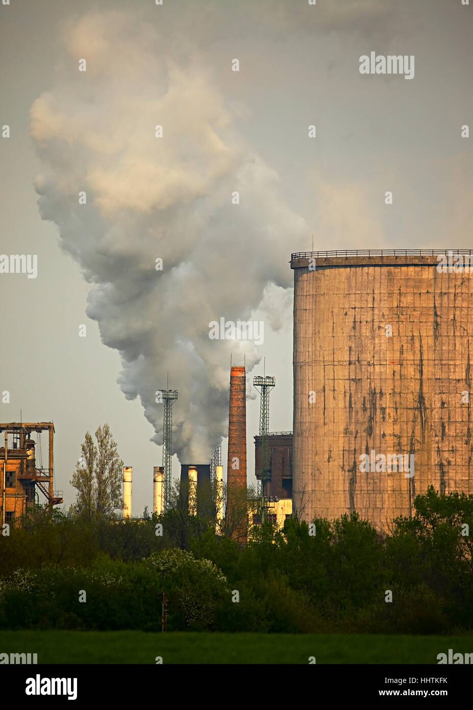 Old, smoking industrial plants Stock Photo - Alamy