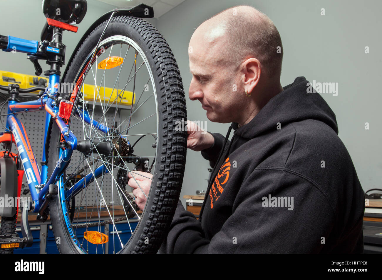 Bicycle mechanic hi-res stock photography and images - Alamy