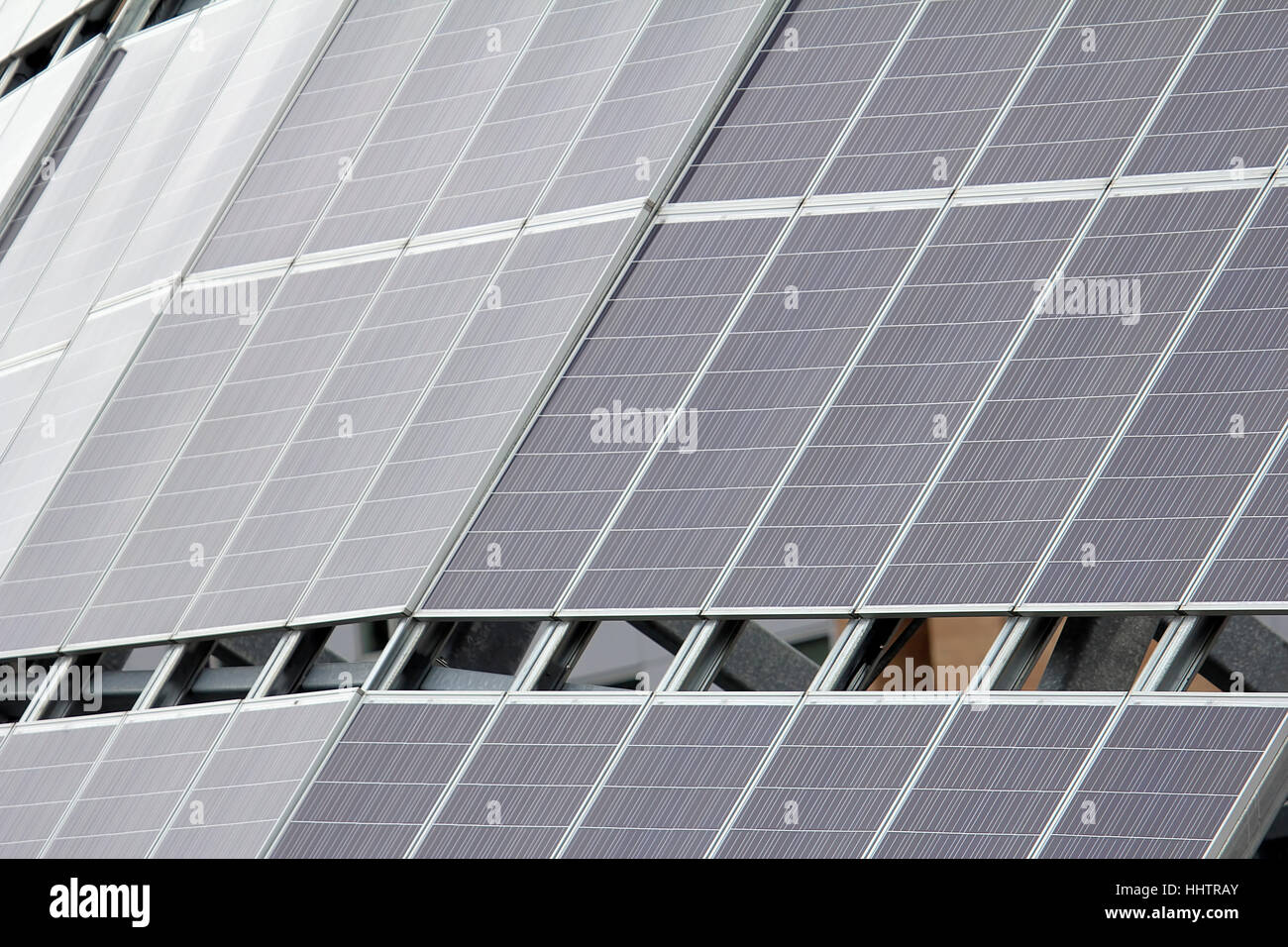 Solar Panels on Building Rooftop Stock Photo - Alamy