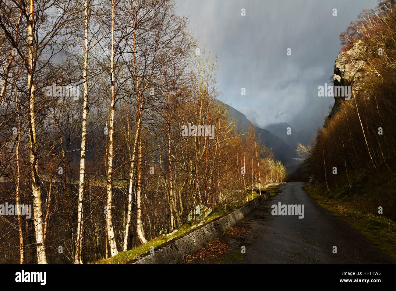 run-down road in rural landscape Stock Photo - Alamy