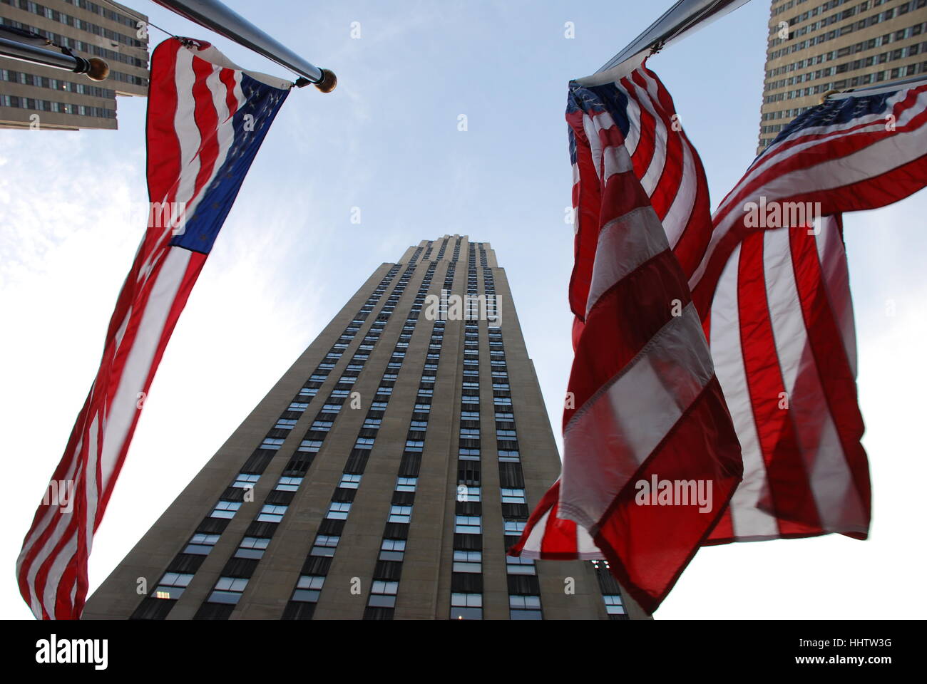 rockefeller centre manhattan usa flag new york Stock Photo - Alamy