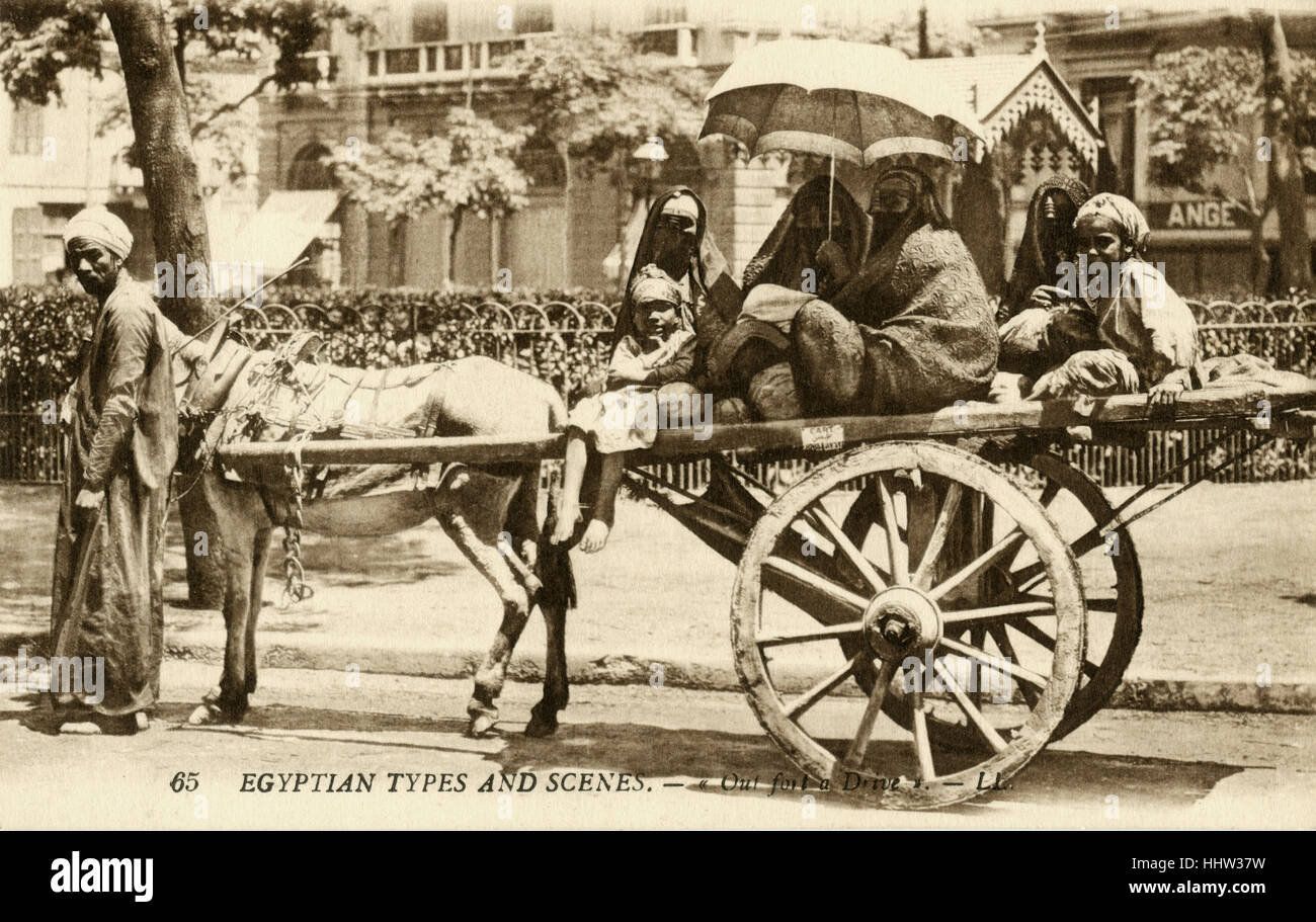 Women and children riding on a horse drawn cart, Egypt. Early 20th ...