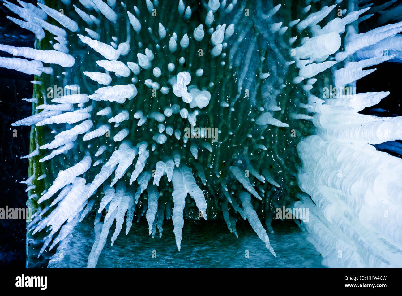 Lot of sharp and long icicles Stock Photo - Alamy
