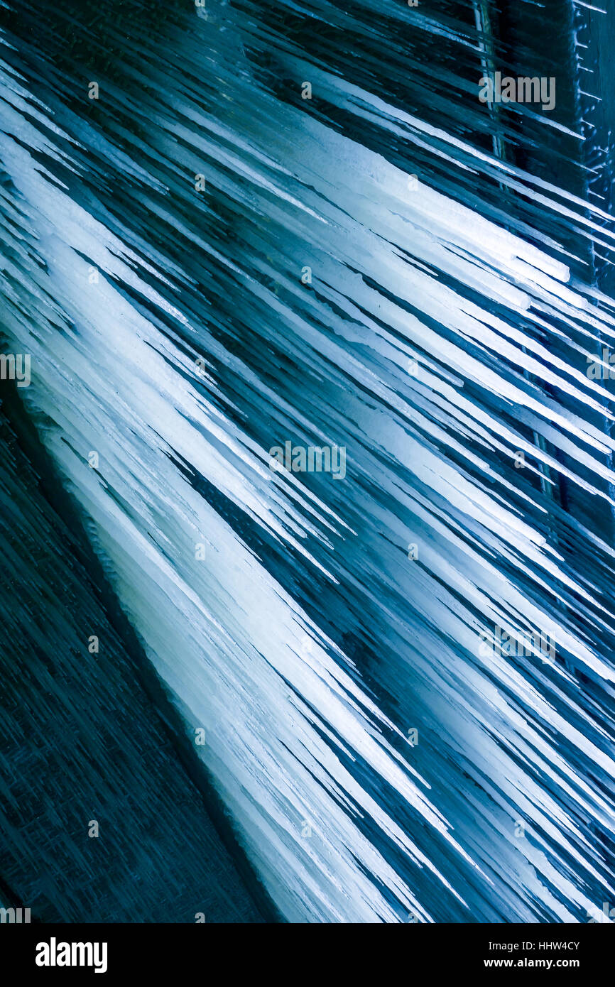 Lot of sharp and long icicles Stock Photo - Alamy