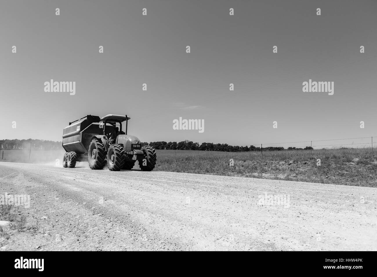 Tractor on rural road Black and White Stock Photos & Images - Alamy
