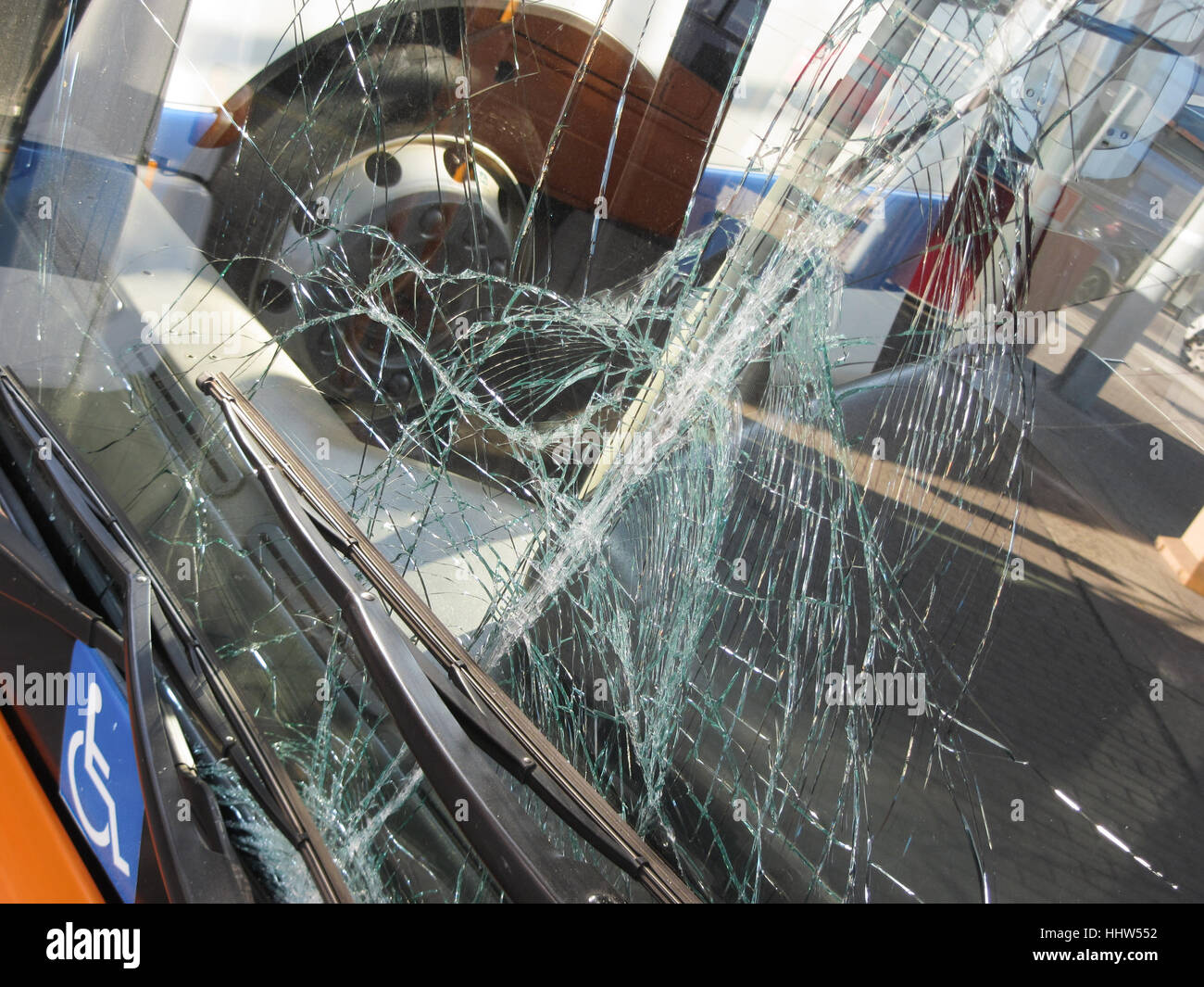 unbreakable frontal glass damaged by crash in a public transport bus ...