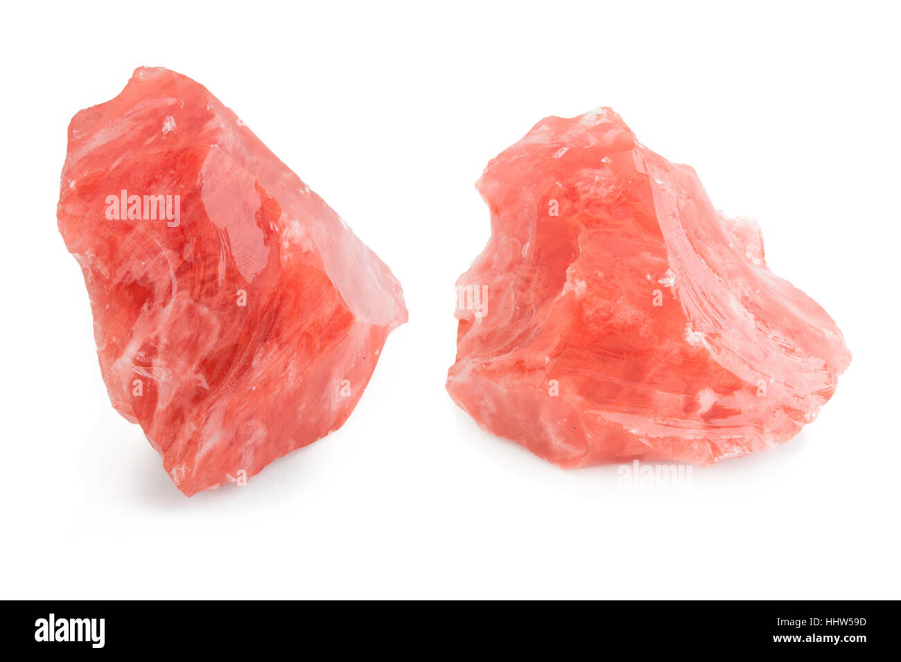 Red obsidian in white background Stock Photo - Alamy