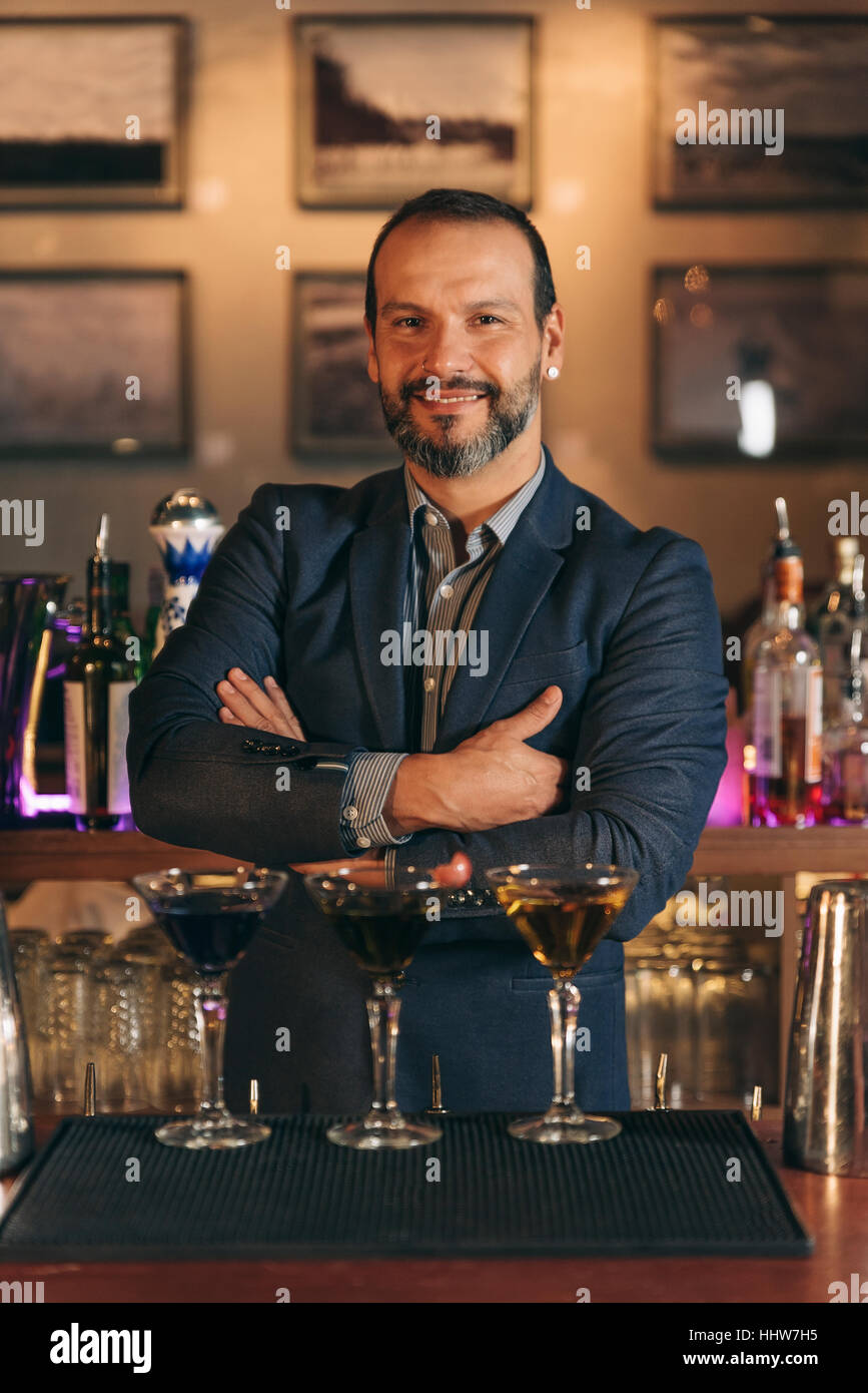 Expert barman is making cocktail at night club Stock Photo - Alamy