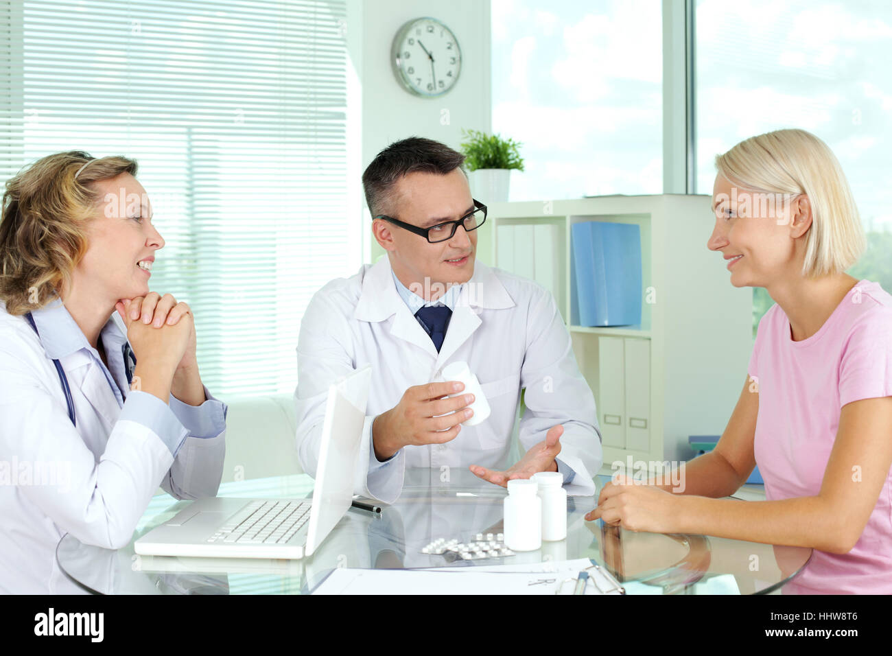 Seated sitting speaking uniform hi-res stock photography and images - Alamy