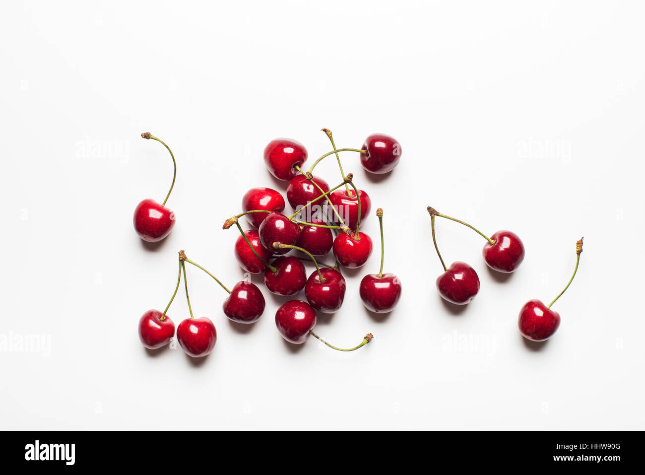 Fresh Cherries on white background close up Stock Photo - Alamy