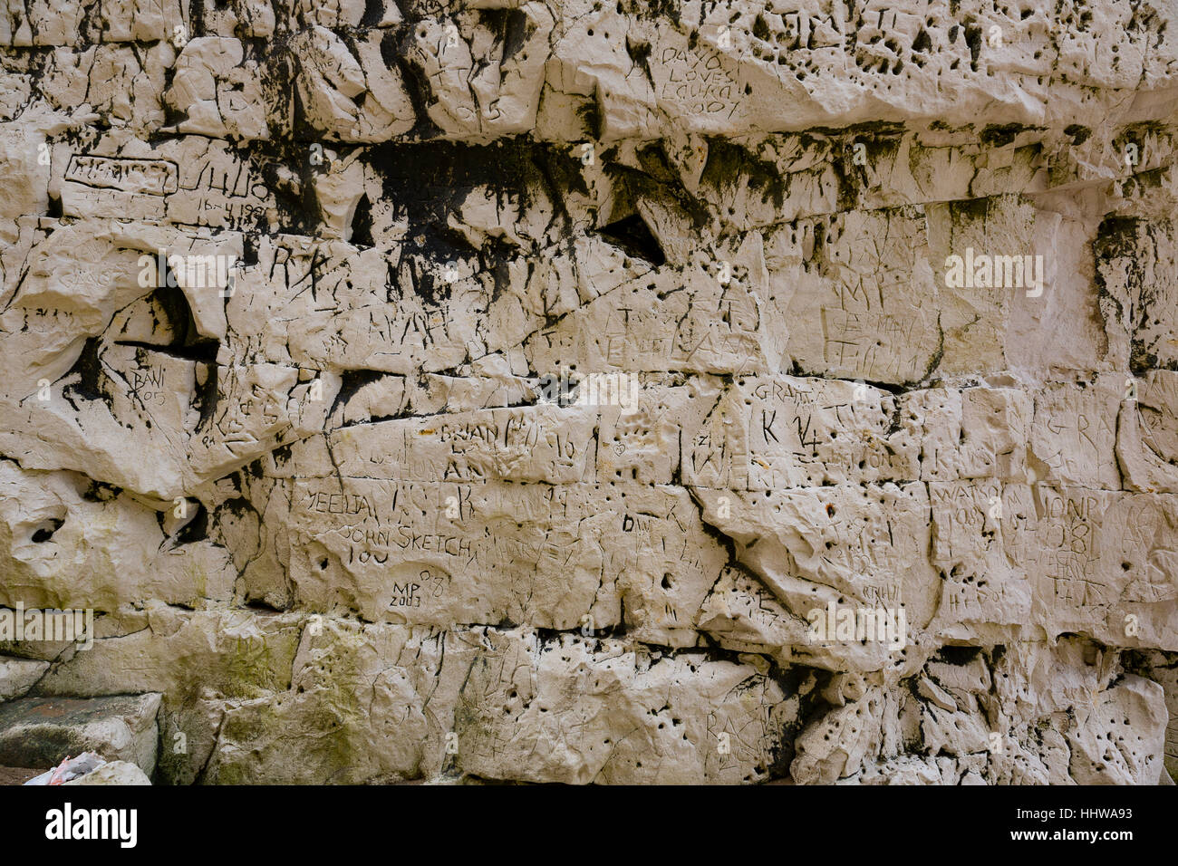 Kingsgate Bay, Margate, Kent. Detail view of graffiti etched into chalk ...