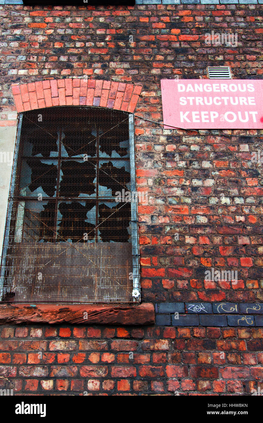 Old derelict building with "Dangerous Structure Keep Out" sign Stock ...