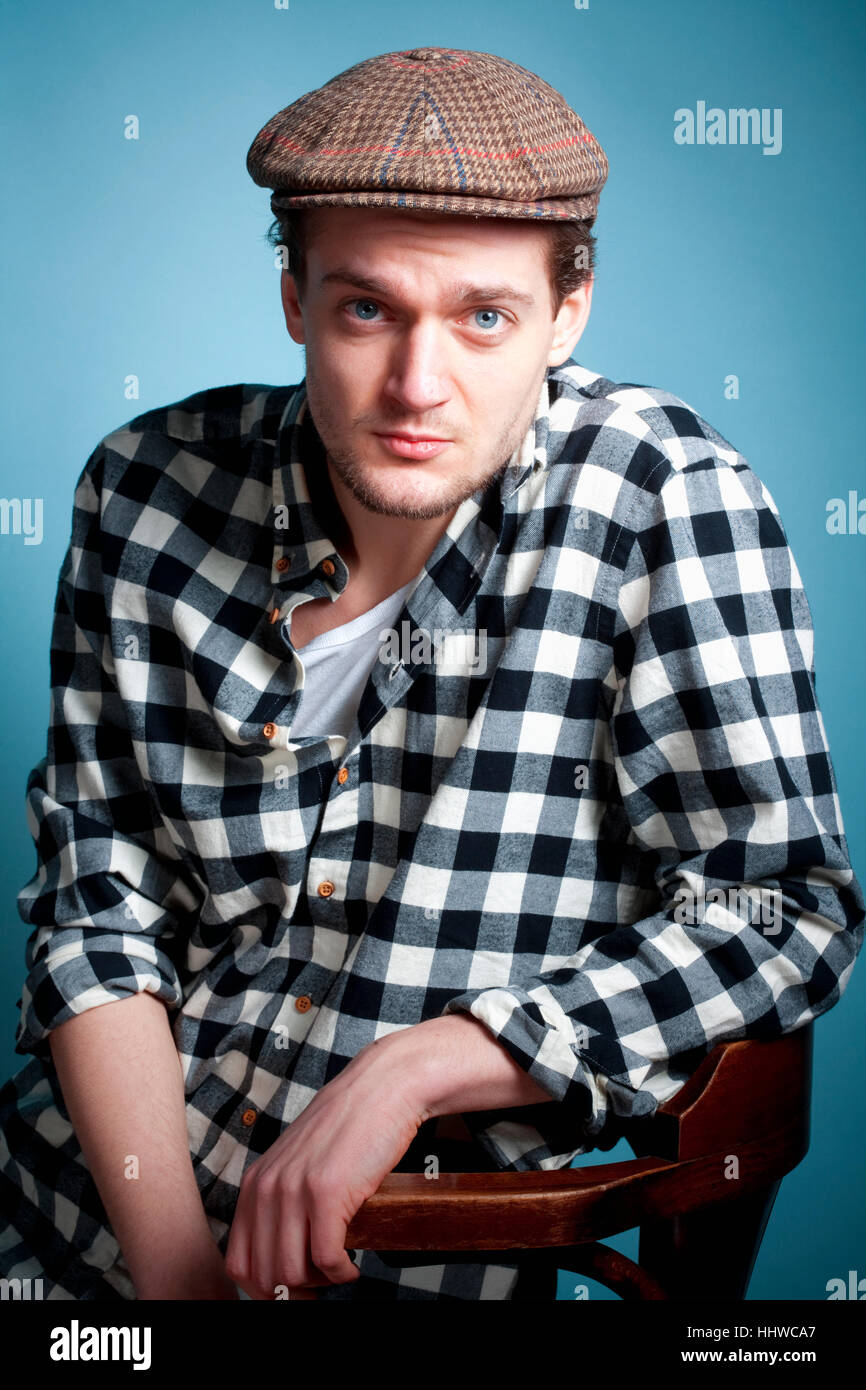 Man in a blue cap hi-res stock photography and images - Alamy