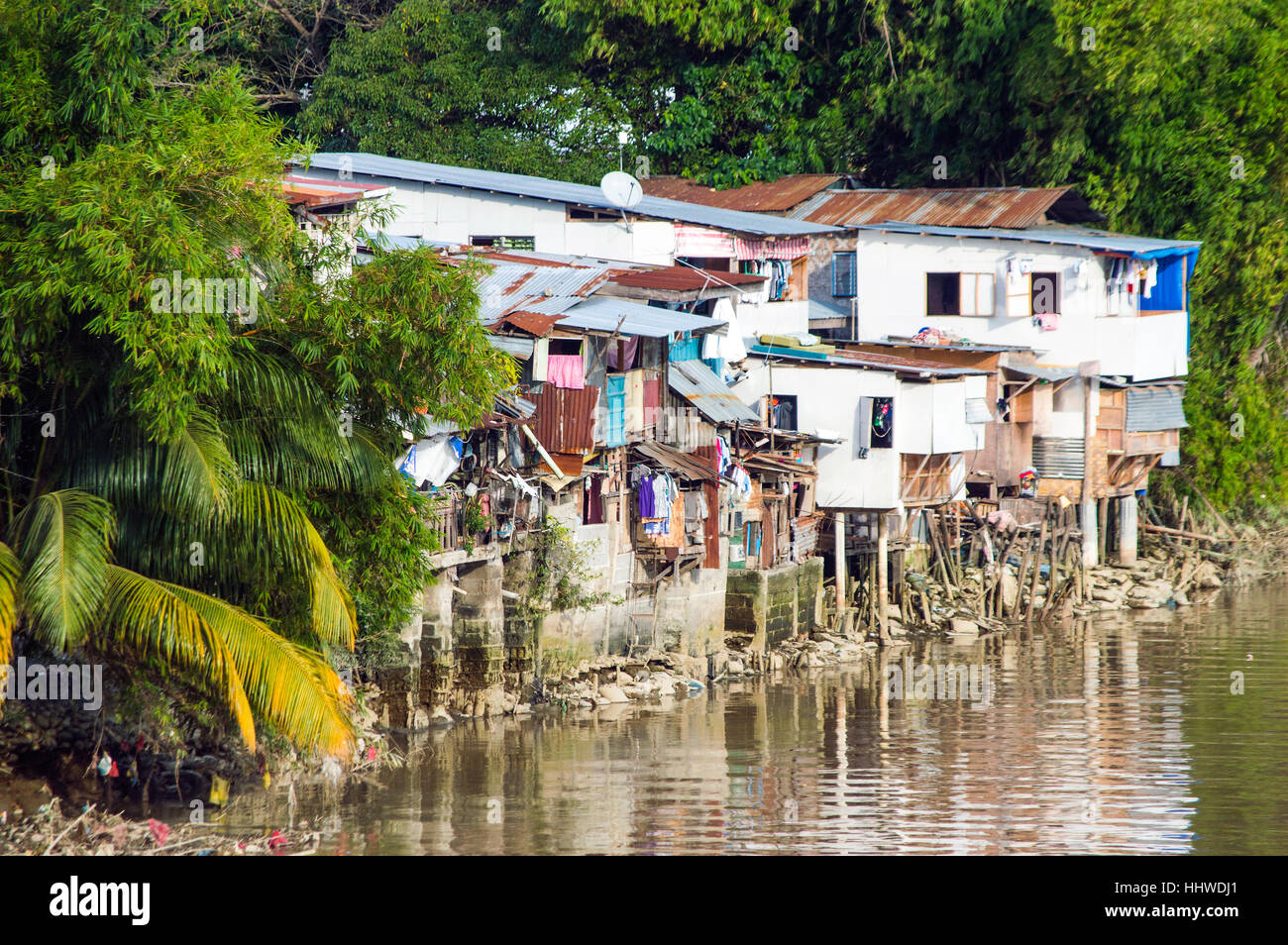 Slum housing along Bangkerohan River, Davao, Davao Del Sur, Philippines ...