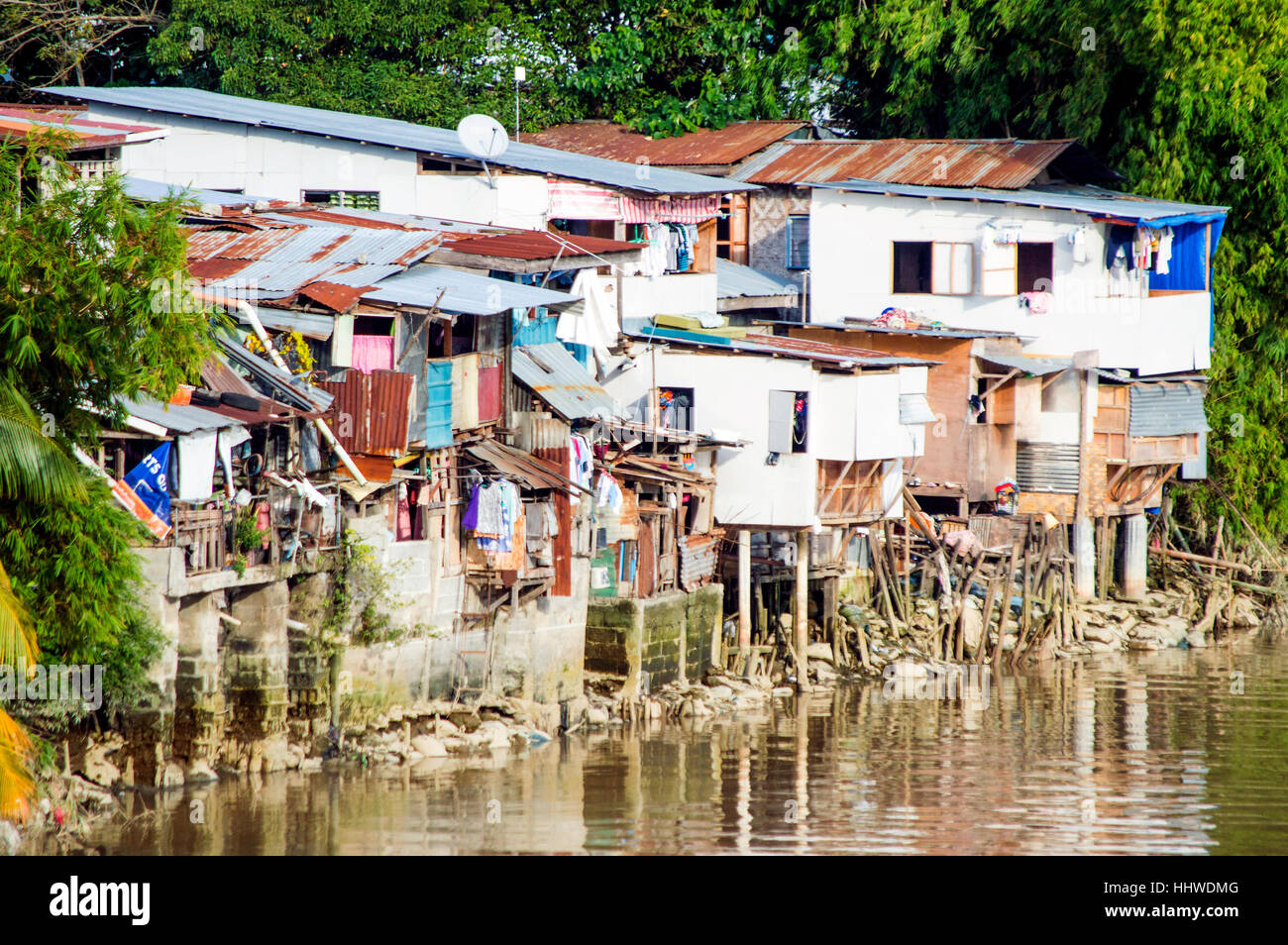 Slum housing along Bangkerohan River, Davao, Davao Del Sur, Philippines ...