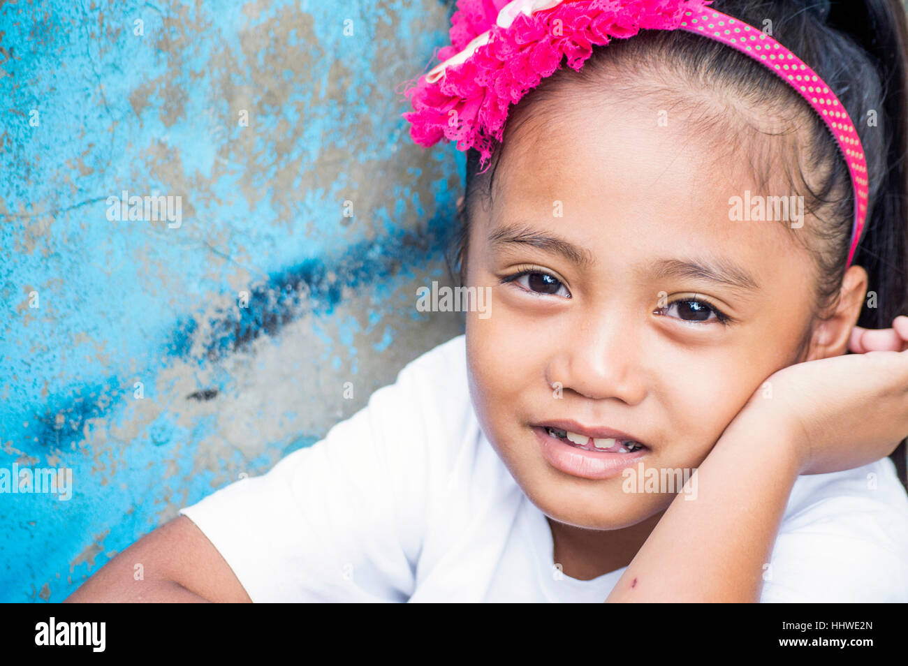 Small girl in slum by Bangkerohan River, Davao, Davao Del Sur ...