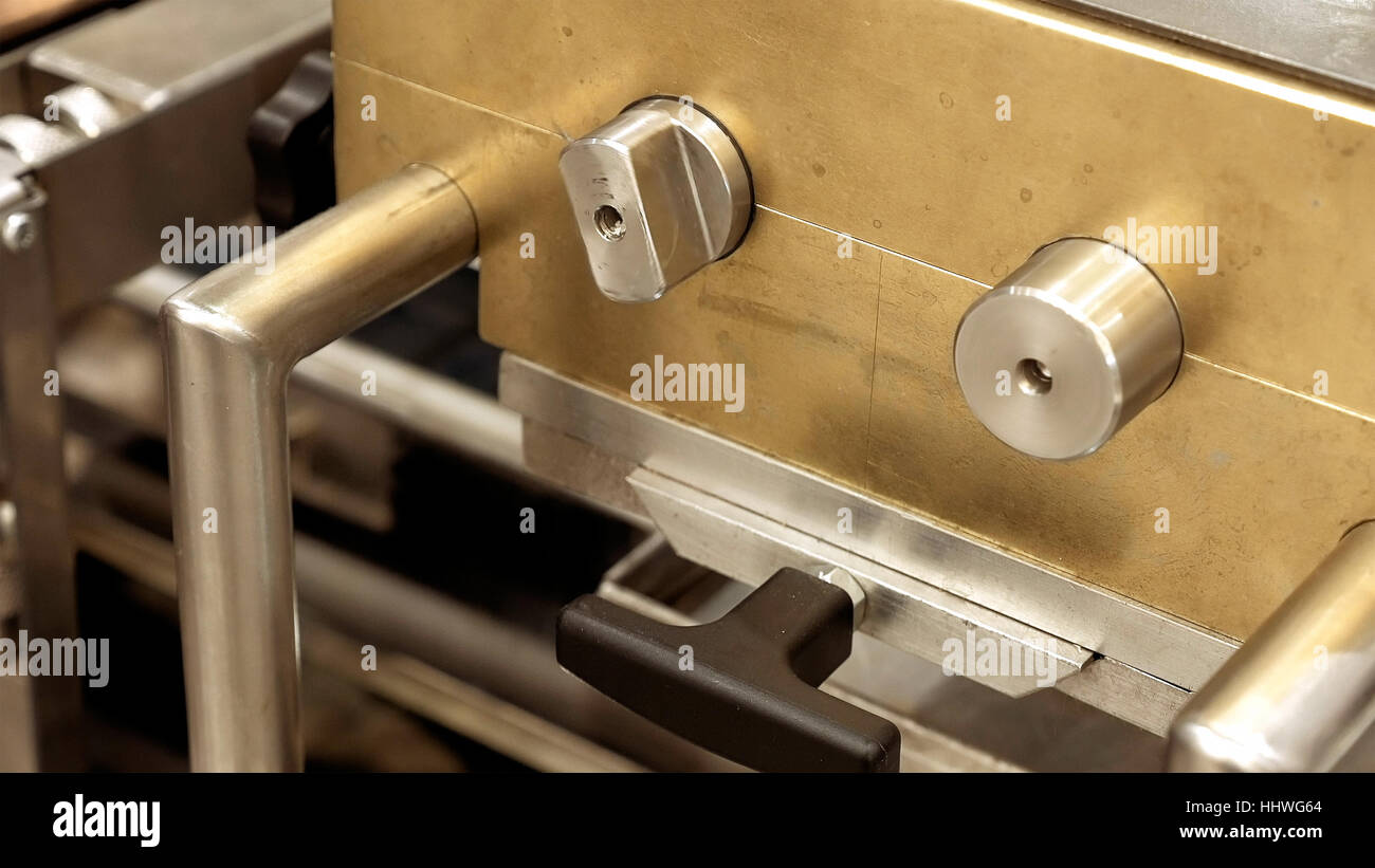 Mechanical equipment with rotating handle Stock Photo - Alamy