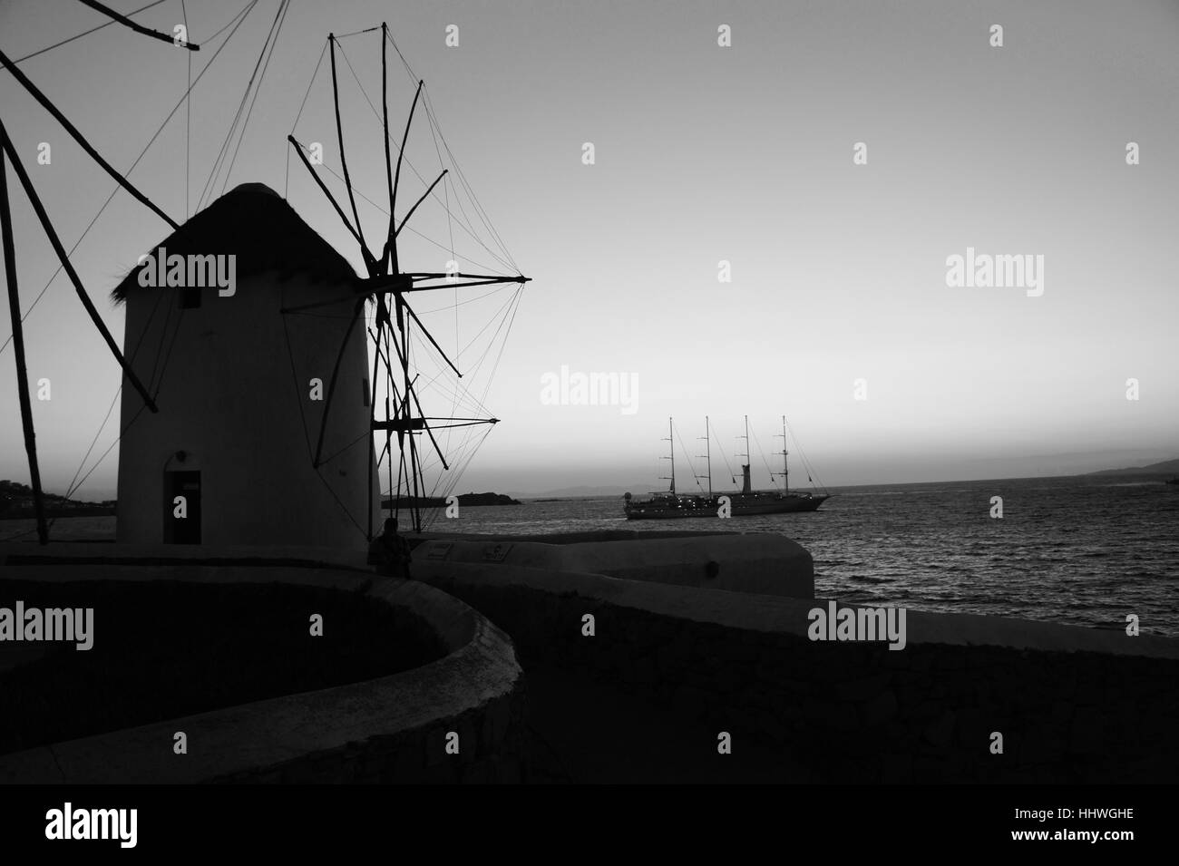 Windmill by the sea Stock Photo - Alamy