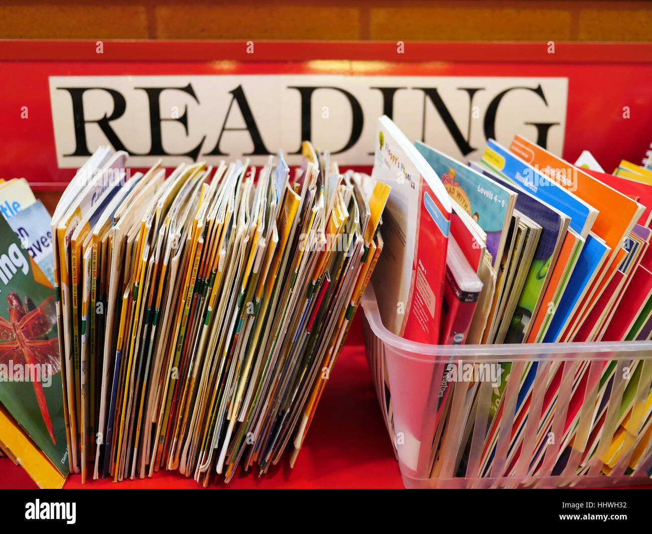 reading books in a primary school Stock Photo - Alamy