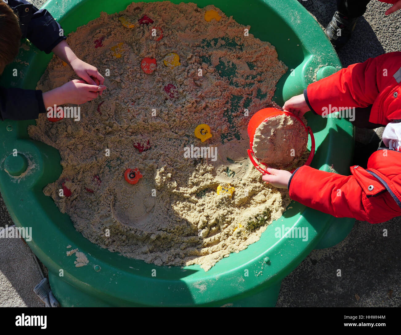 primary school children playing with sand Stock Photo - Alamy