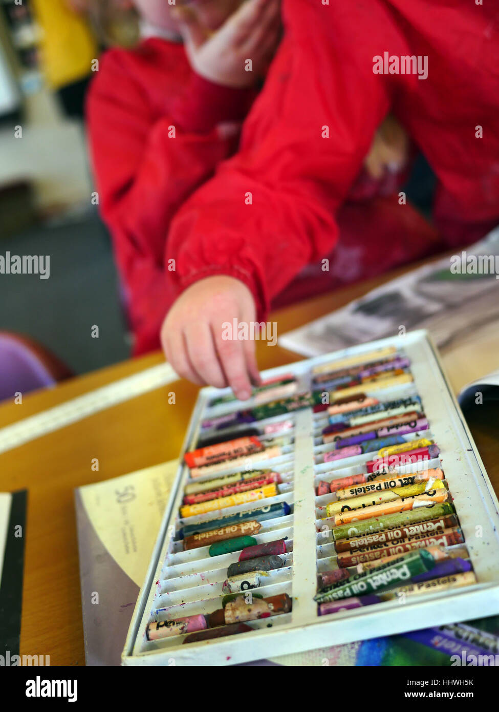 coloured crayons in a primary school Stock Photo - Alamy