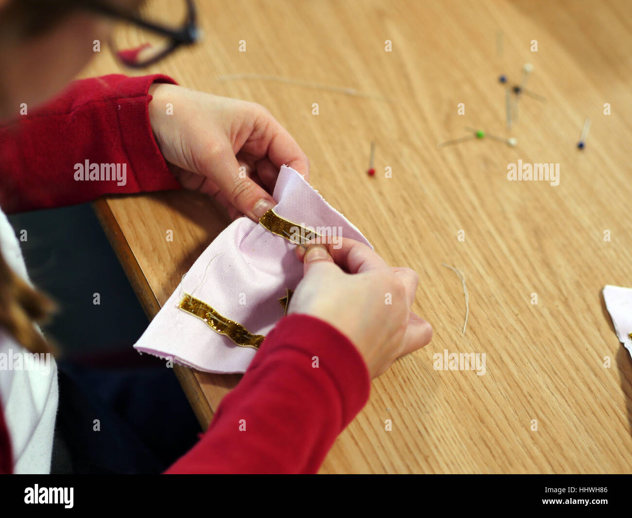 primary school child sewing Stock Photo - Alamy