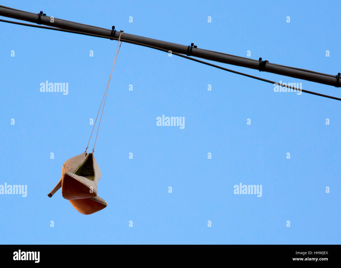 Dangling shoes hi-res stock photography and images - Alamy